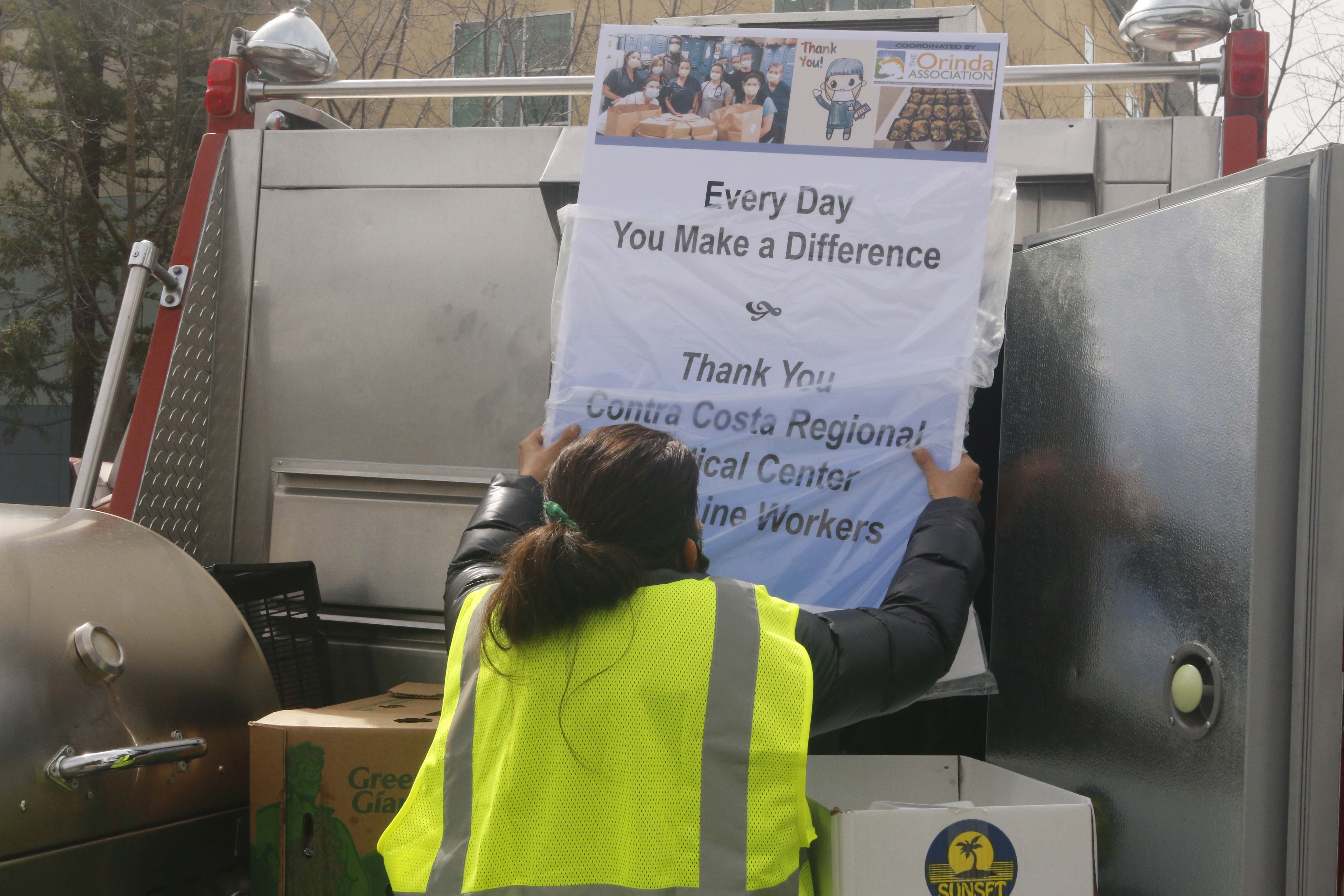 CopyrightLoriACheung 03-17-21 Latika Malkani + OA Sign at Fire Truck ...